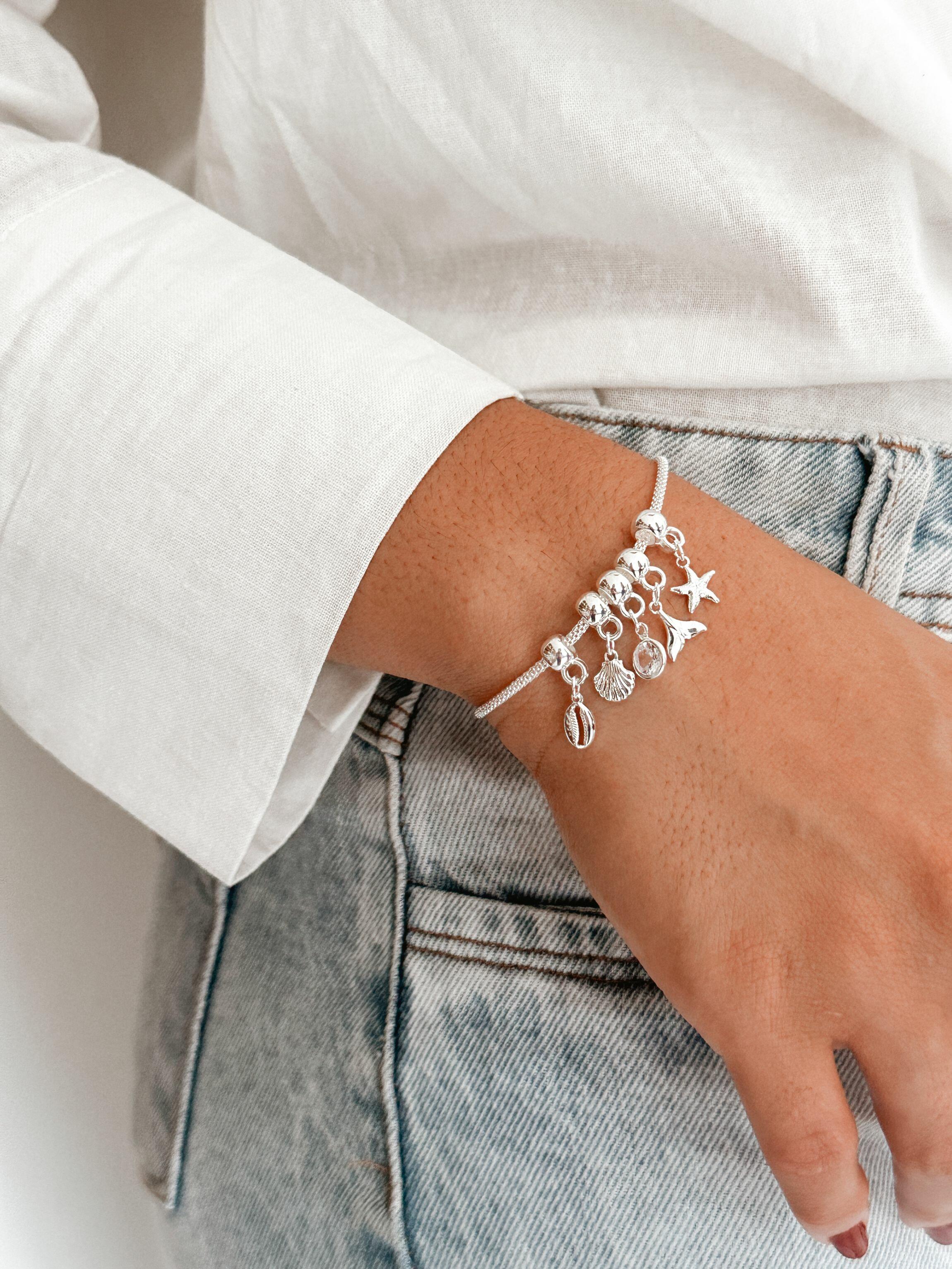 Comprar Pulseira mar pingente cristal - a partir de R$23,65