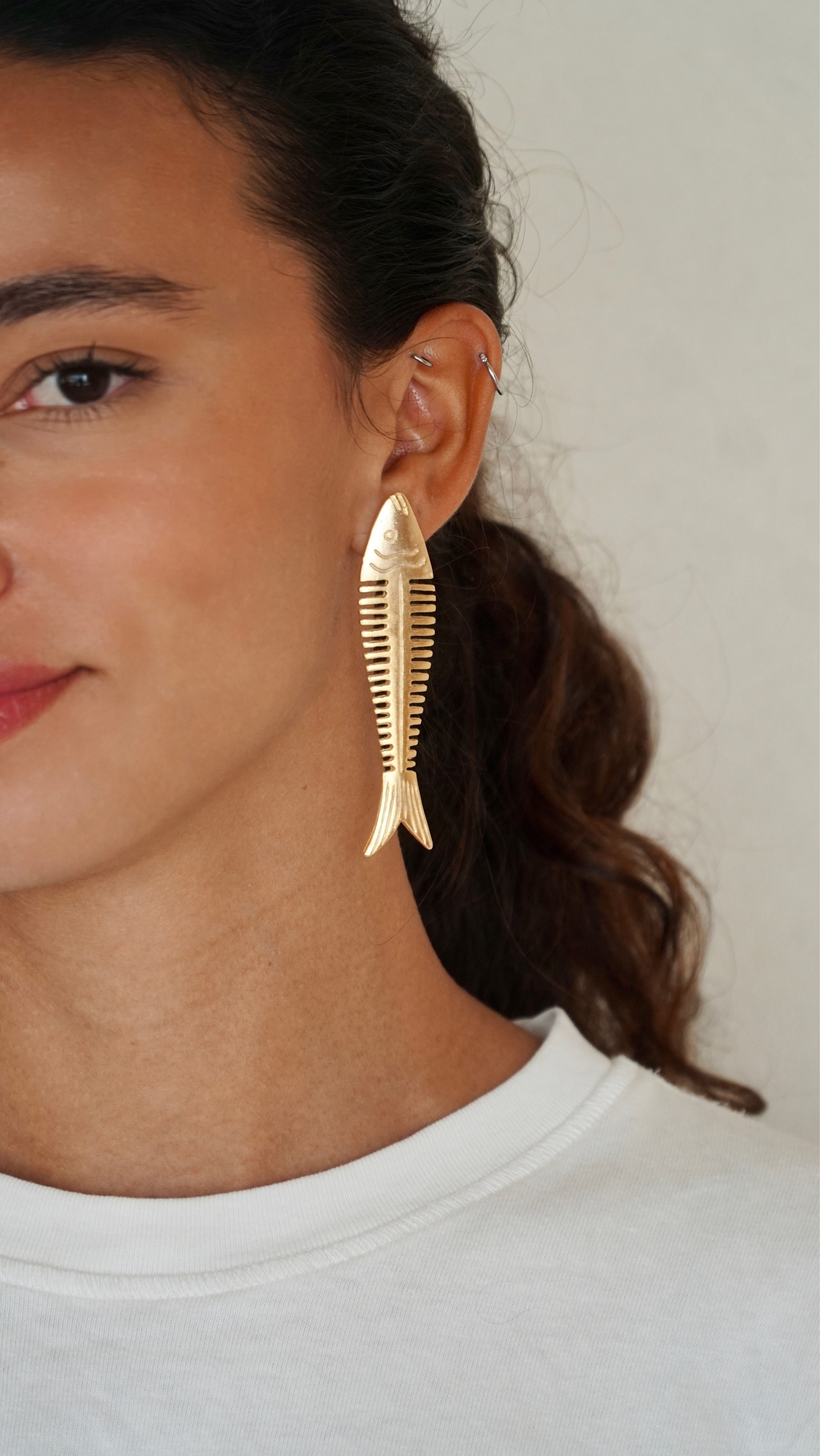 Comprar BRINCO ÓLEO DE BALEIA DOURADO - a partir de R$376,20 - YLLA