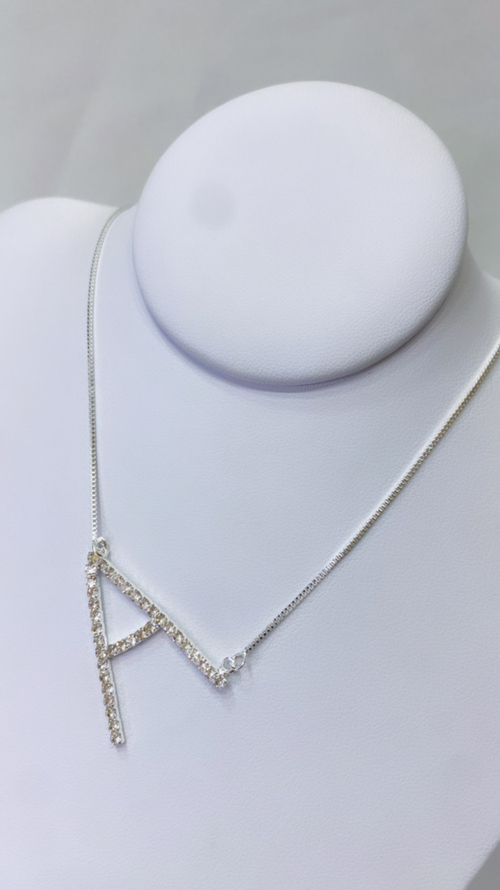 Comprar Colar Inicial Cravejado Prata - R$8,99 - Maju Folheados