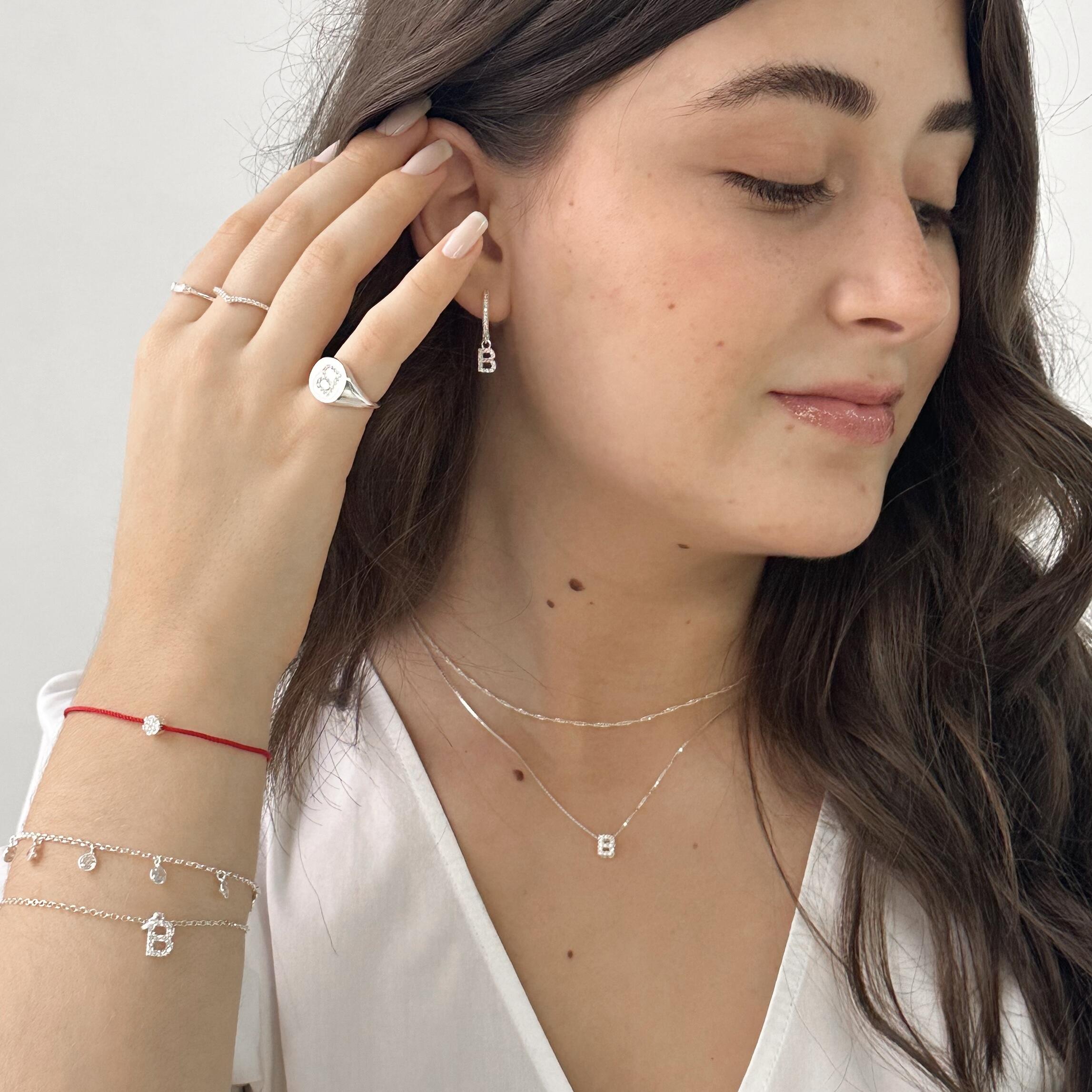 Comprar ANEL LETRA CRAVEJADA REGULÁVEL NO190 - Purpose Pratas