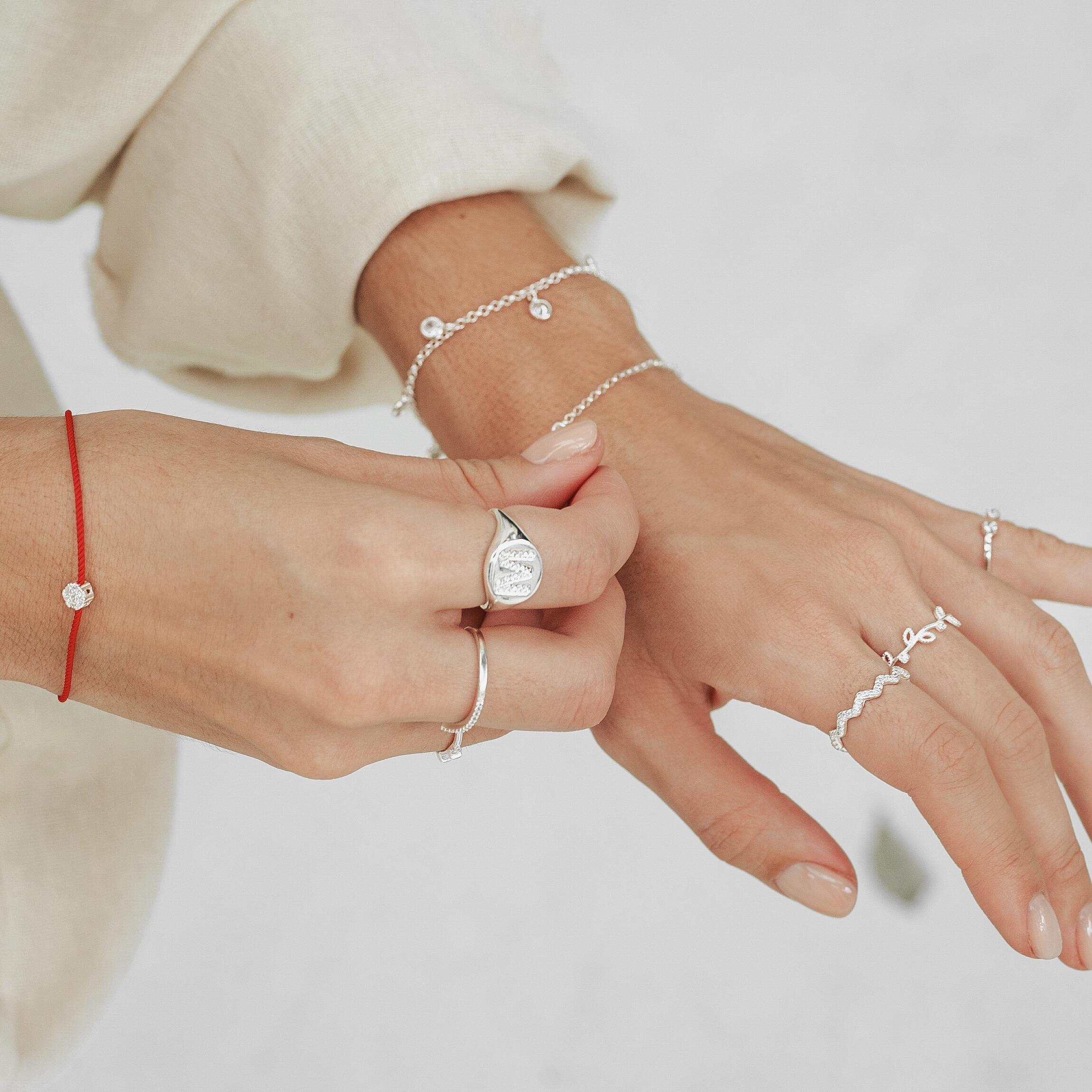 Comprar ANEL LETRA CRAVEJADA REGULÁVEL NO190 - Purpose Pratas