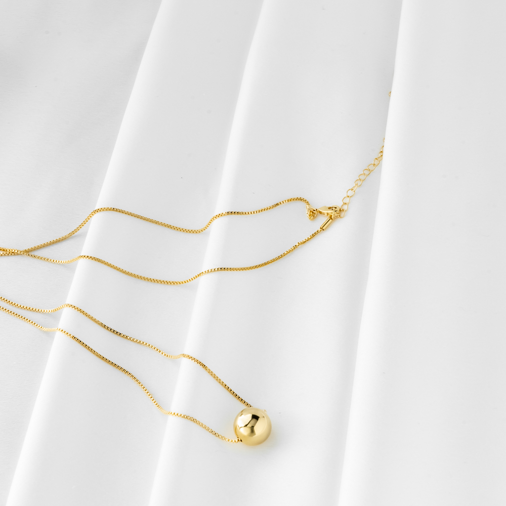 Comprar Conjunto Colar Longo e Brinco Bola - Dourado - Anna Vilas