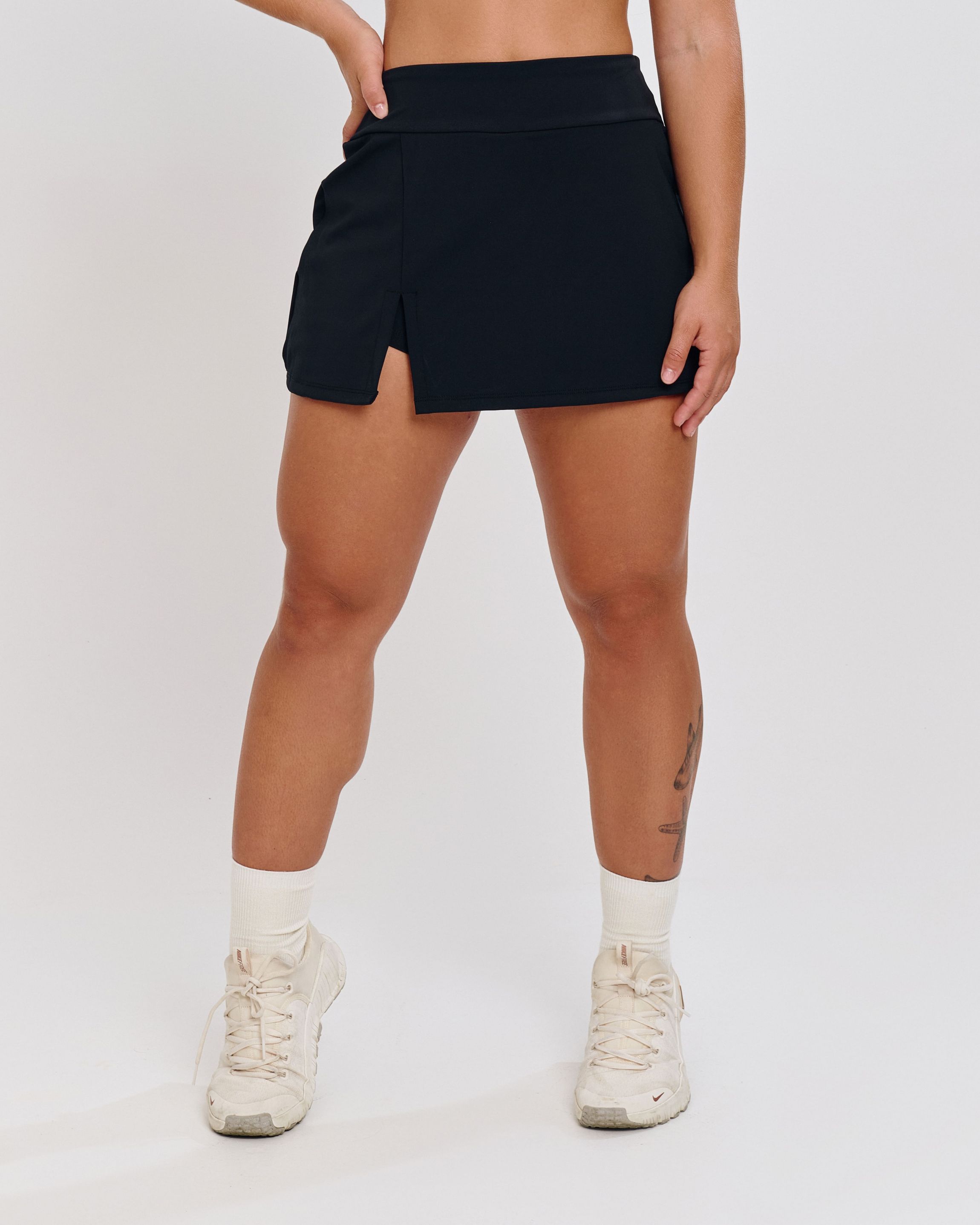 Comprar Short Saia Preto Ju Mamute - a partir de R$94,90 - Roupas de ...