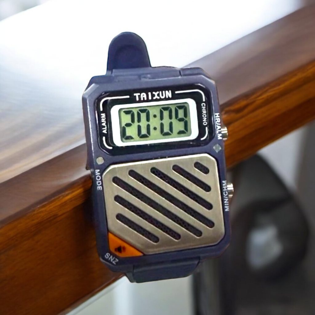 Comprar Relógio Fala a Hora Taixun - R$19,99 - Rélógios no Atacado